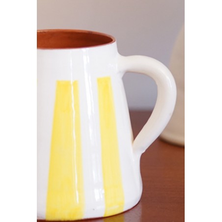 Handcrafted ceramic pitcher with yellow and white stripes made in Portugal.